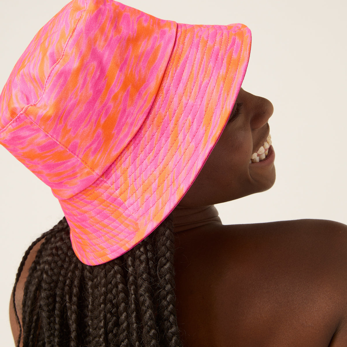 Reversible Bucket Hat in Mauritus Orange/Purple | Modibodi – Modibodi EU